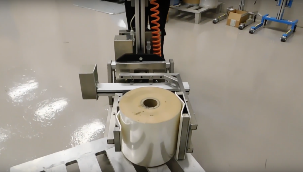 Squeeze-O-Turn Roll Handling Unit